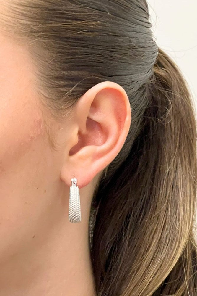 Round Hoop Snap Latch Earrings in a Silver Finish By Origen Imports